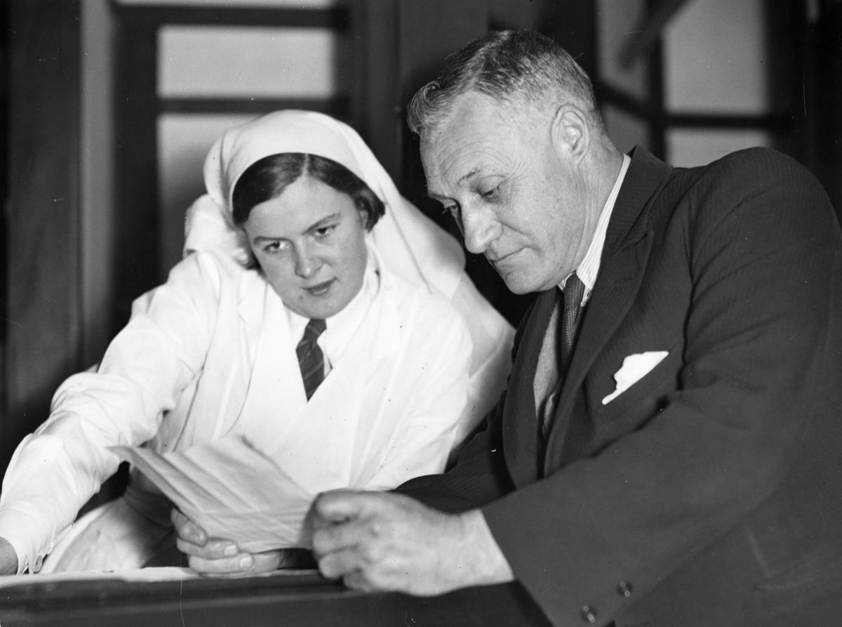 [Captain Frederick Harold Batten and an unidentified dental nurse ...